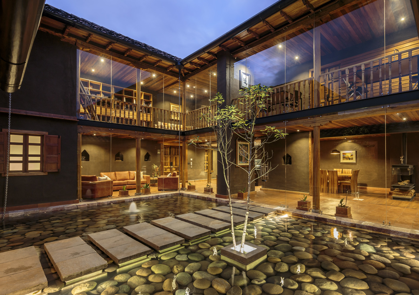 Folk style house but Modern and a Water court in the middle of the house